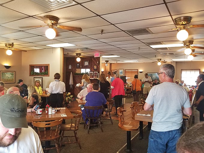 A bustling dining room that feels like a community living room, where strangers become friends over shared syrup bottles.