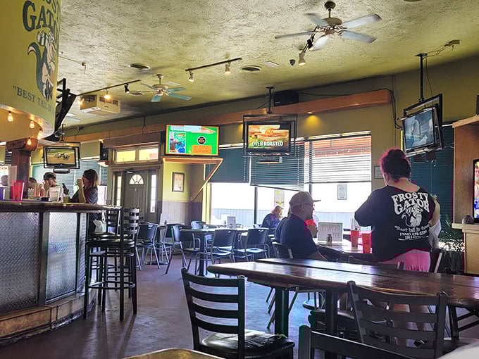 A snapshot of happiness: diners enjoying good food, good company, and probably some good gossip. It's like a Norman Rockwell painting, but with better wings.