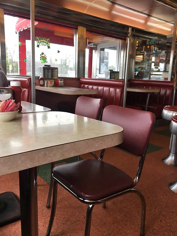 Retro chic at its finest! These booths have probably heard more town gossip than a hairdresser on a busy Saturday.