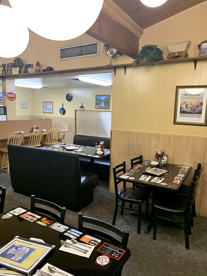 Booths designed for lingering conversations and multiple coffee refills. The wood paneling has absorbed decades of breakfast satisfaction.