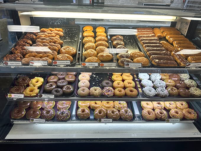 Behold, the Great Wall of Donuts! This display case is like a museum of edible art, but you're encouraged to touch&mdash;and taste!