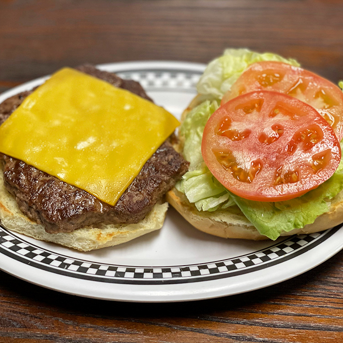 Behold the Dom Burger, a beefy behemoth that laughs in the face of your New Year's resolutions. Resistance is futile.
