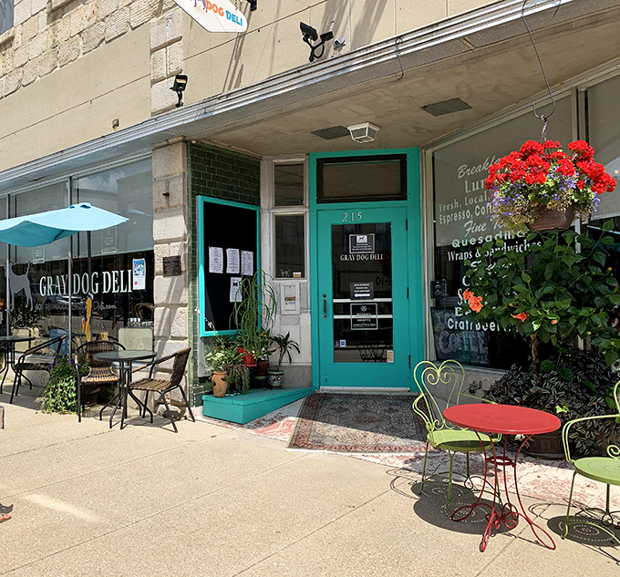 The Gray Dog Deli: where charm is always on the menu. With that cheery turquoise door, it's like Wes Anderson designed a sandwich shop!