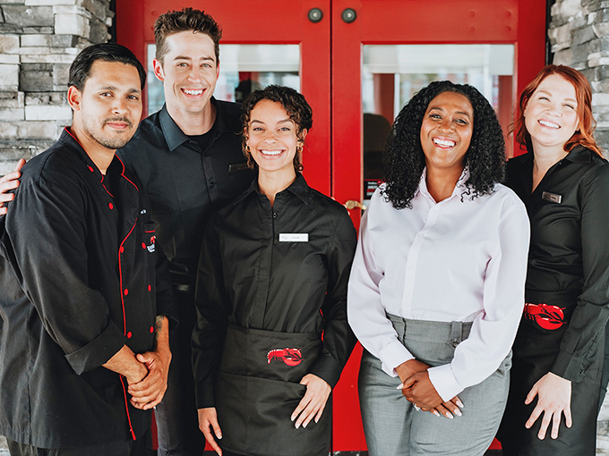 The dream team of the deep: These smiling faces are your ticket to seafood nirvana. They're like the Avengers, but with less world-saving and more butter-melting.