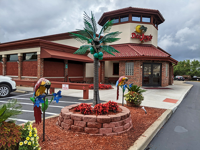 Parrot statues and palm trees? It's like Jimmy Buffett's "Margaritaville" had a delicious love child with a smokehouse!