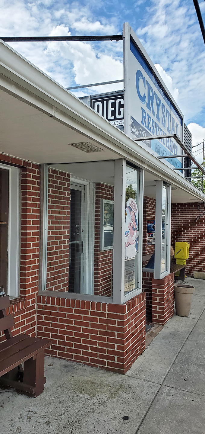 The gateway to gastronomic glory! This entrance doesn't just lead to a restaurant; it's a portal to a world where calories don't count and joy is served in heaping portions.