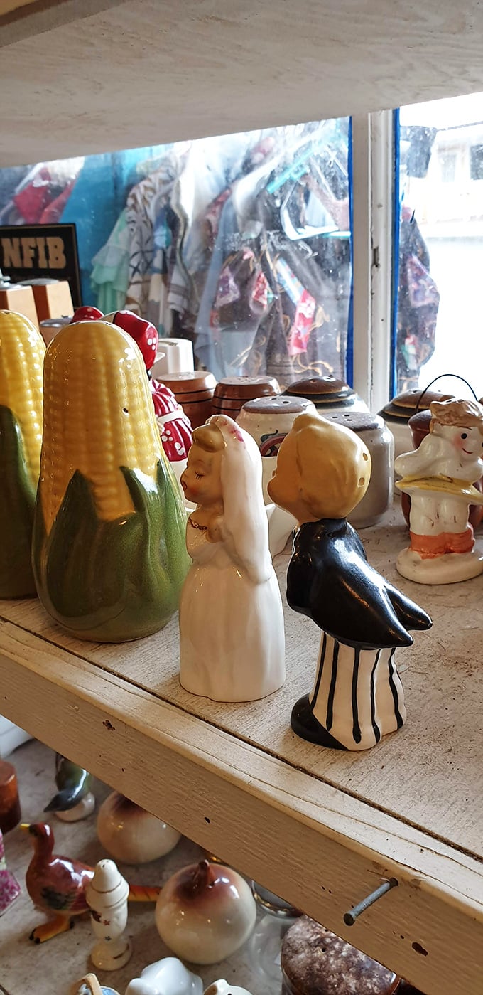 It's a miniature United Nations of tchotchkes! From corn to brides, this shelf is hosting the quirkiest party in town.