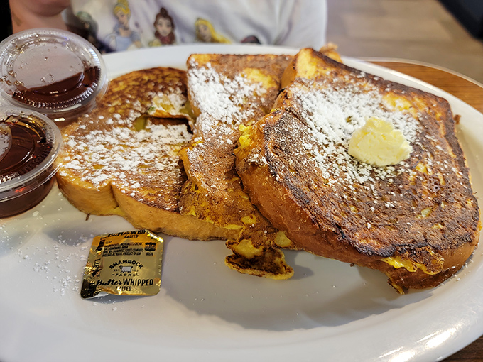 French toast that puts the "ooh la la" in breakfast! This stack is sweeter than your grandma's cheek pinches.