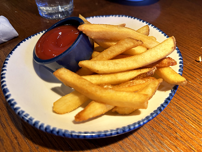 Crispy, golden fries – the unsung heroes of any seafood feast. Pass the ketchup, please!