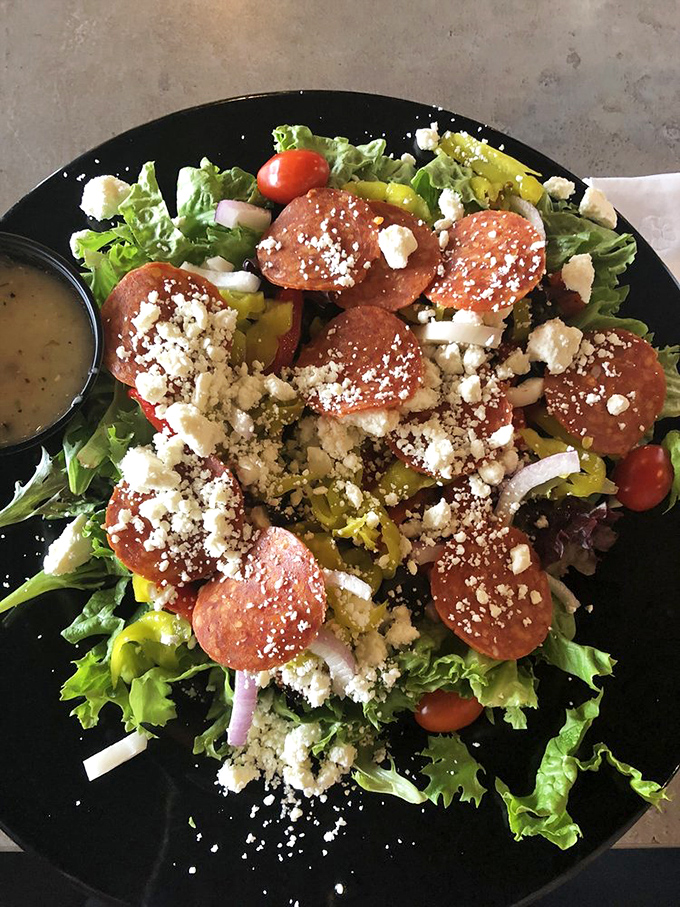 Greek Salad: A Mediterranean vacation on a plate. It's so fresh, you'll swear you can hear bouzouki music playing in the background.