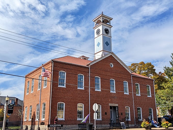 The Historic Hermann Museum's clock tower stands sentinel over town, its brick facade housing treasures from an era when "social media" meant gathering at church.