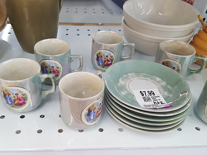 Delicate teacups with just enough kitsch to be charming. Someone's grandmother is nodding approvingly from the great beyond.