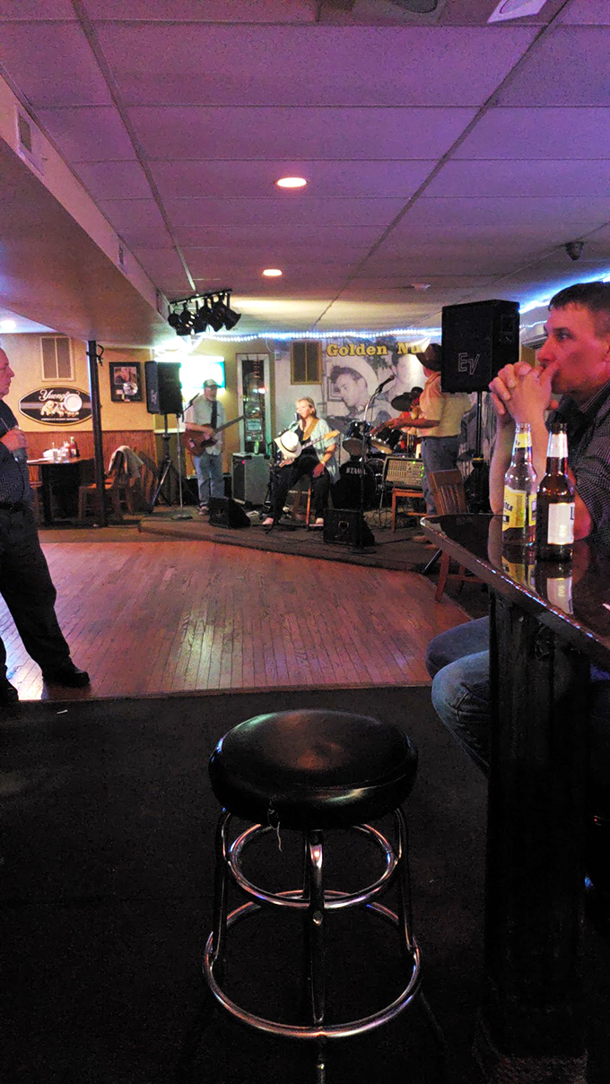 Live country music transforms weekend nights into something special. The stage may be small, but the sound fills the room like the aroma of wings.