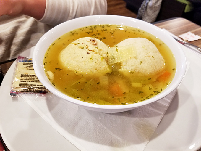 Matzah ball soup: Jewish penicillin that could cure anything from a cold to a bad day. These fluffy orbs of comfort are swimming in liquid gold.
