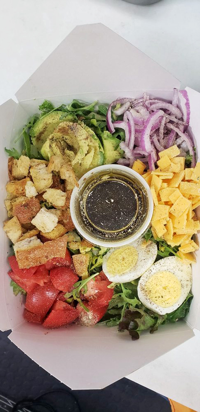 Mike's Salad: proving that "healthy" and "delicious" aren't mutually exclusive. It's like a farmers market decided to play Tetris in a to-go container.