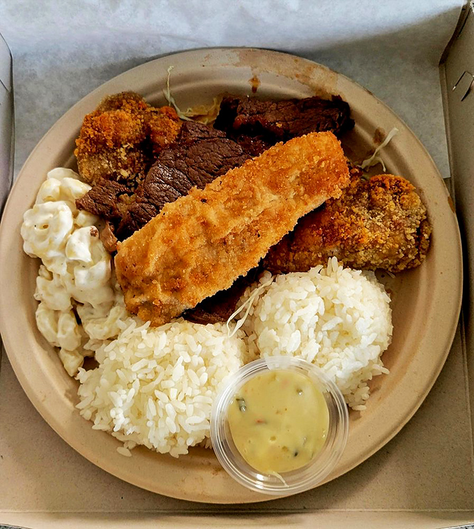The mix plate: Hawaii's culinary United Nations. It's like your taste buds just won a trip around the Pacific Rim!
