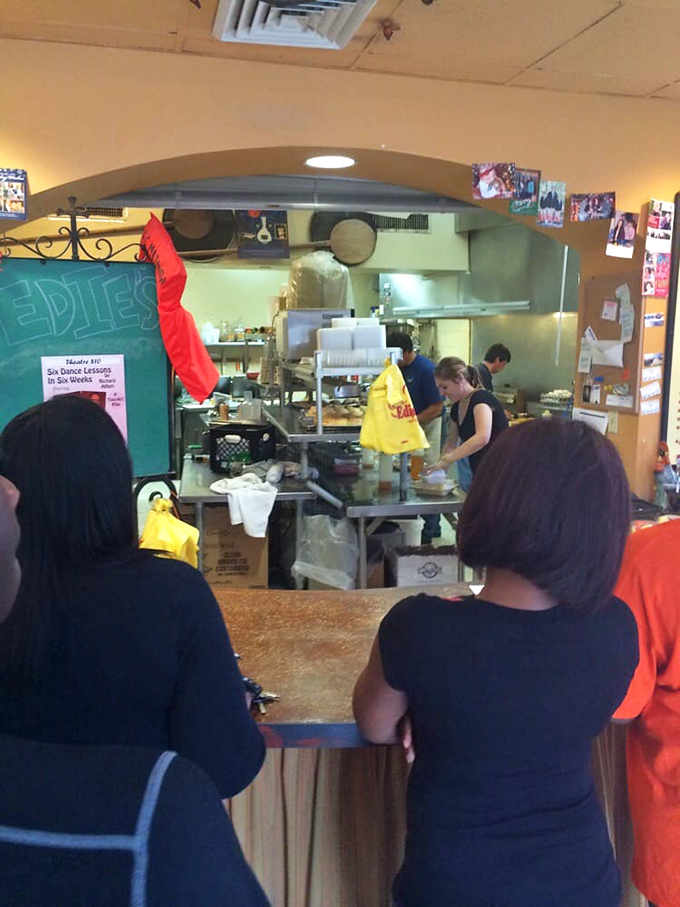 Peek behind the curtain of deliciousness! This open kitchen is like a live cooking show, but with better aromas and tastier results.