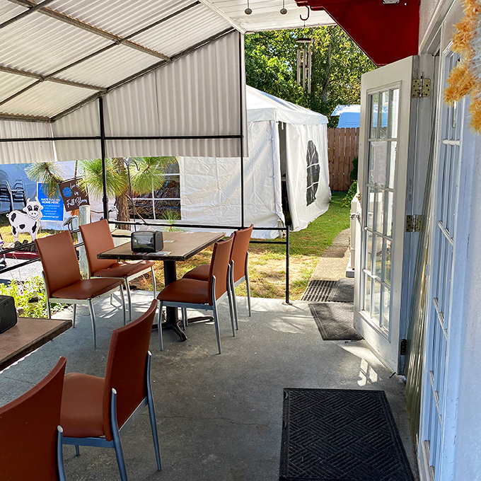 Al fresco feast, anyone? This outdoor dining area is perfect for those who like their barbecue with a side of vitamin D and fresh air.