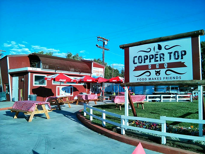 Picnic perfection with a side of sunshine! This outdoor seating area is where BBQ meets fresh air and good times.
