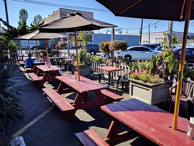 Seattle sunshine meets Texas tradition at these outdoor picnic tables, surrounded by greenery and barbecue anticipation.