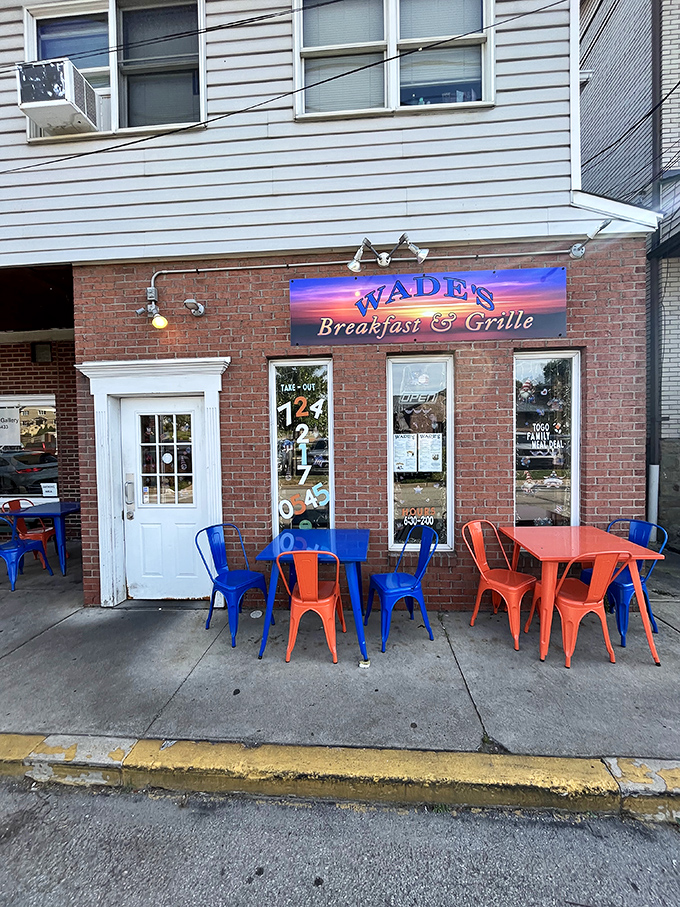 Outdoor seating with a pop of color. Because sometimes, your eggs need a side of fresh air and people-watching.