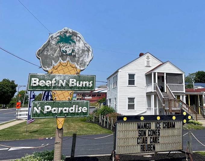 You had me at "Beef 'n Buns"! This sign is like a beacon of hope for hungry travelers. Paradise found, indeed!
