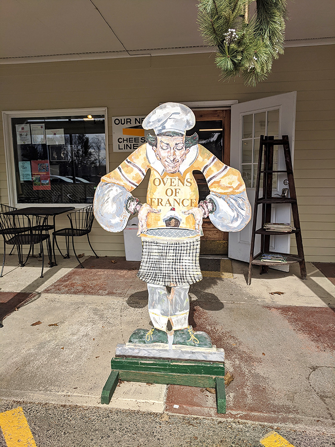 Meet the unofficial greeter of Ovens of France. He's a bit stiff, but he's got great taste in aprons!
