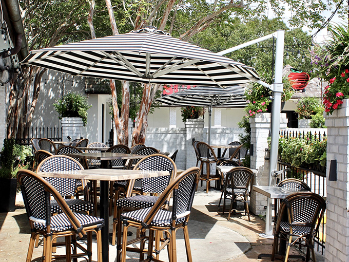 Alfresco dining that's more 'ooh la la' than 'y'all come back now'. This patio is where Southern charm meets Parisian chic.