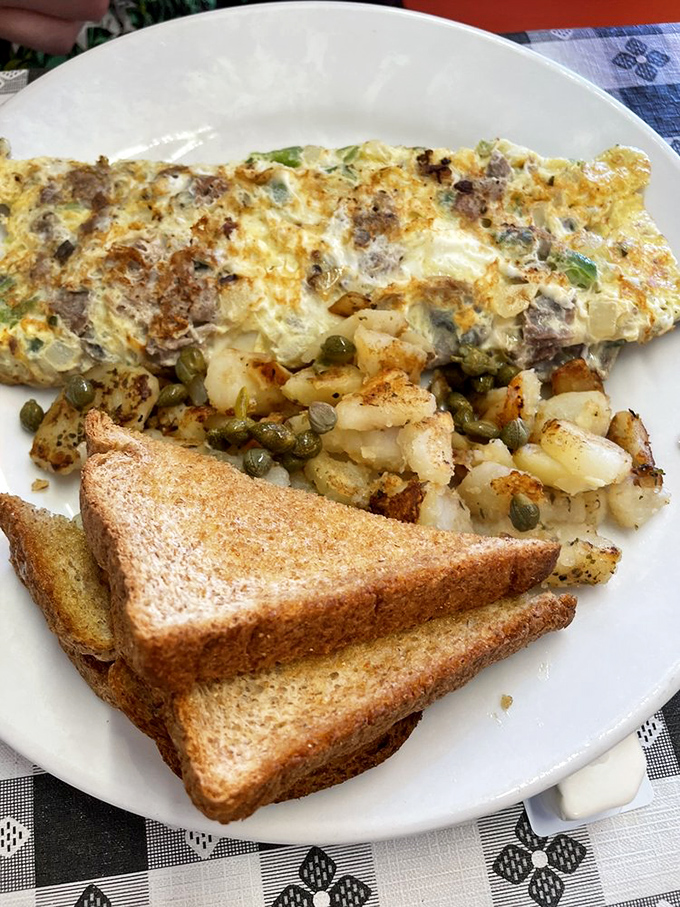 Philly Cheesesteak Omelet: The City of Brotherly Love wrapped in eggy goodness. It's like Rocky for your taste buds!