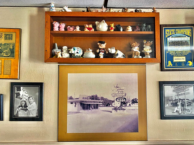 A wall of memories and kitsch. It's like your grandma's living room met a barbecue joint, and they decided to redecorate together.