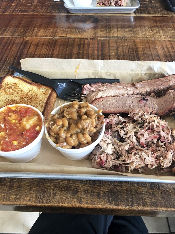 The dynamic duo of barbecue: pulled pork and beef brisket join forces to create a plate of pure joy. Resistance is futile.