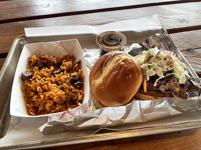 Sandwich goals achieved! This pulled pork beauty, paired with zesty red rice, is what lunch fantasies are made of.