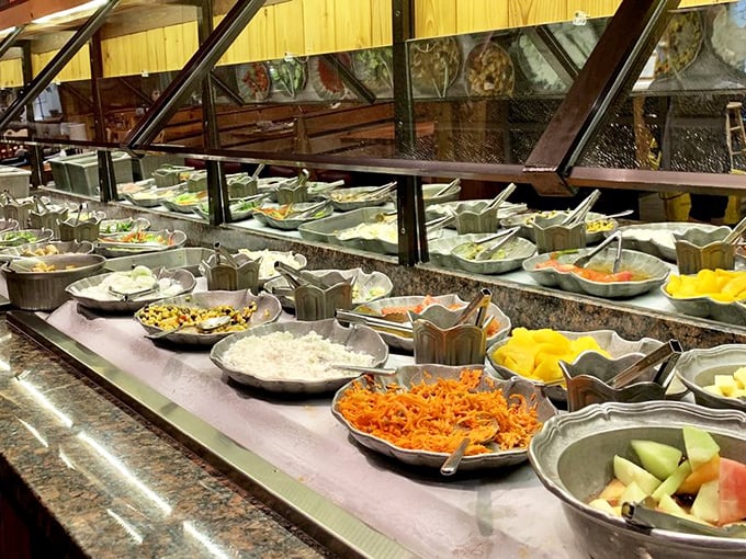 A salad bar that could make even Ron Swanson consider eating a vegetable. It's like a garden party, but with more bacon bits.