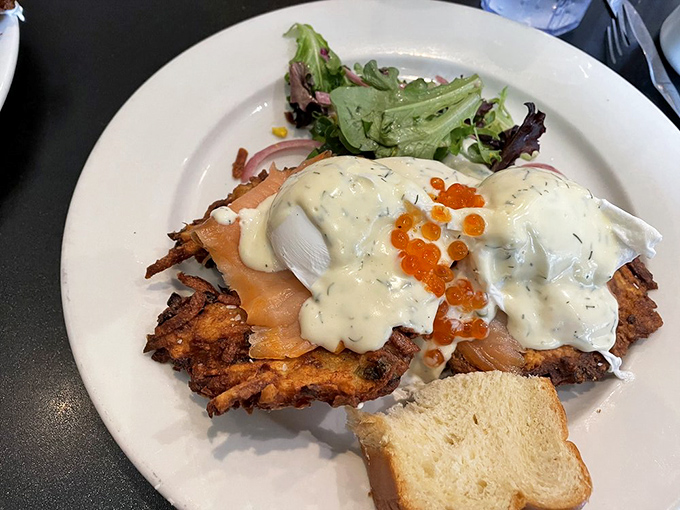 Salmon Benedict that puts ordinary eggs Benedict in time-out. The perfect hollandaise, bright salmon, and those vibrant salmon roe!