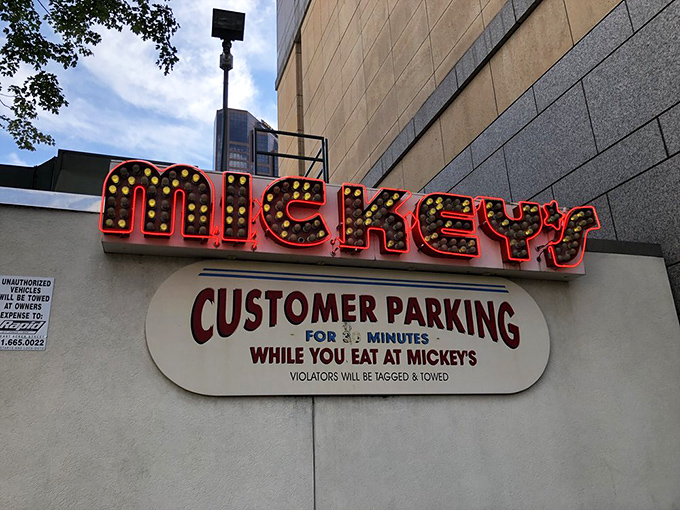 Blink and you'll miss it! Mickey's clever signage reminds us that good things come in small packages &ndash; and with a strict 30-minute parking limit.
