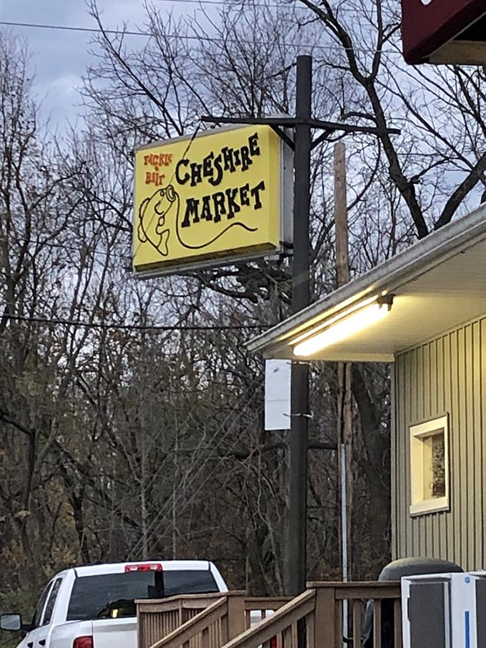 A sign of good things to come! This charming signage is like a beacon of hope for hungry travelers, promising a market of delights just around the corner.