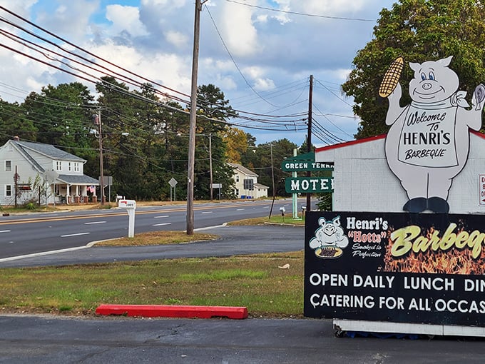 You had me at "Barbeque"! Henri's sign is like a beacon of hope for hungry travelers and BBQ enthusiasts alike.