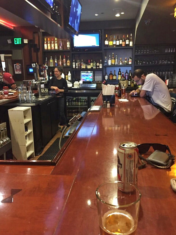 Where the magic happens! These bartenders are like cocktail conductors, orchestrating a symphony of spirits for thirsty patrons.