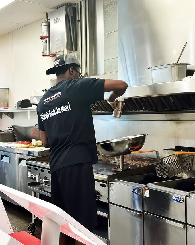 Behind the scenes magic! CJ's staff are the unsung heroes, turning humble ingredients into mouthwatering masterpieces. Give them a round of applause (and a generous tip)!