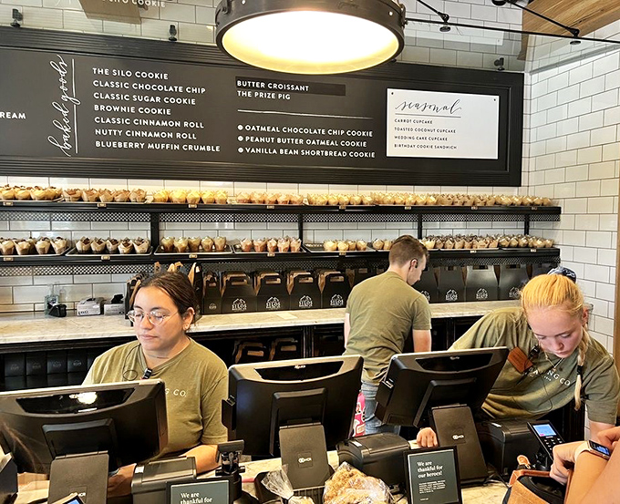 The unsung heroes of our sugar highs! These dedicated staff members are like Santa's elves, but instead of toys, they're crafting edible joy.