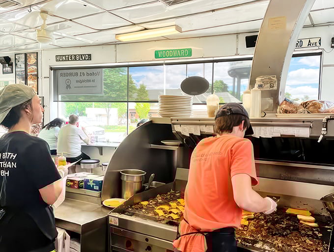The unsung heroes of Hunter House! These dedicated staff members are the wizards behind the burger curtain.