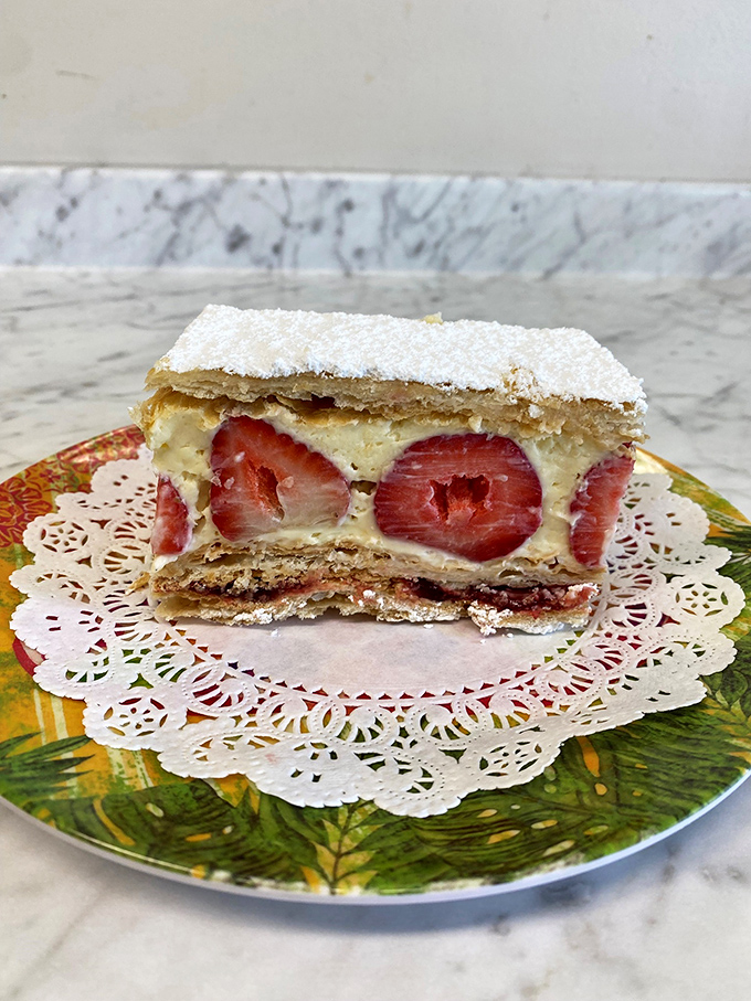 The Strawberry Napoleon: Layers of deliciousness that would make even Bonaparte surrender to temptation. Vive la p&acirc;tisserie!