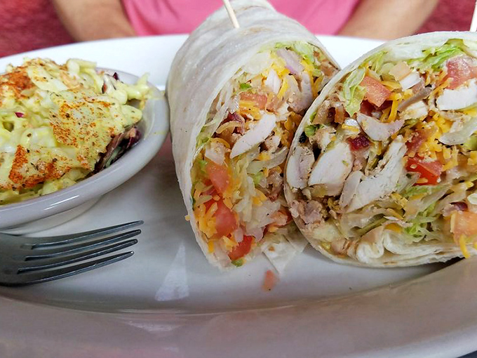 Wrap star! This chicken wrap is ready for its close-up, packed with flavors that'll make your lunch hour feel like a vacation.