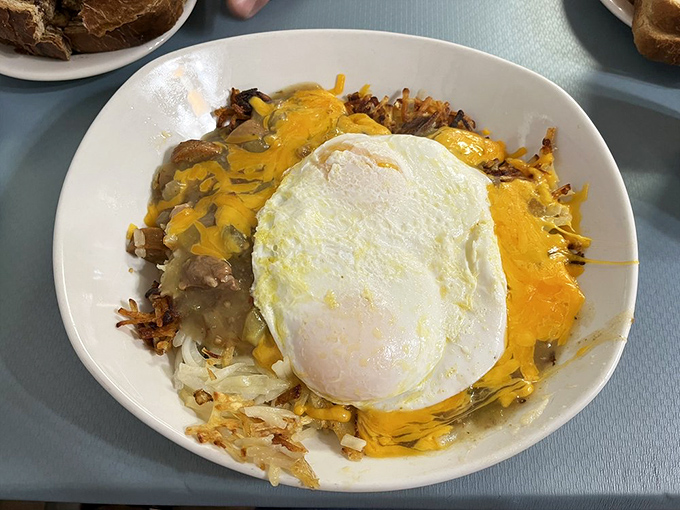 Behold, the breakfast of champions! This skillet is a flavor fiesta that'll have you planning your next visit before the first bite.