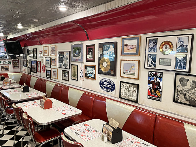"A wall of fame that puts Hollywood to shame!" The diner's decor is a treasure trove of memorabilia, each piece telling a story of rock 'n' roll, classic cars, and simpler times.