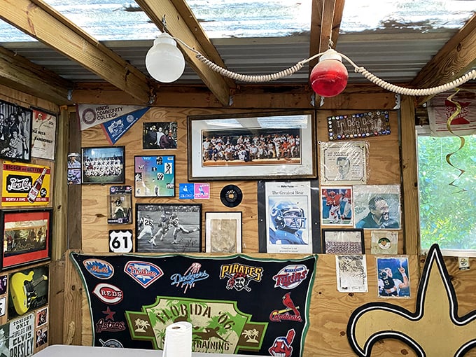 A wall of fame that's more eclectic than your grandpa's attic. It's like "I Spy" for grown-ups, with a side of nostalgia.