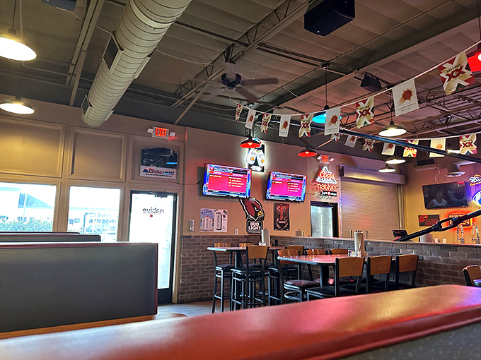 More screens than Times Square and more team spirit than a pep rally. It's sports heaven with a side of wings.