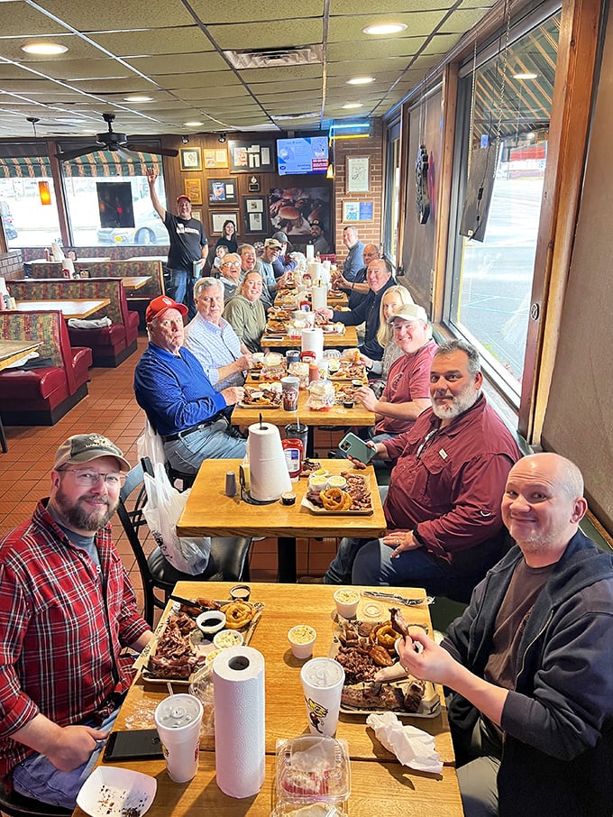 Squad goals, BBQ edition! These happy diners prove that good food and great company are the secret ingredients to pure joy.
