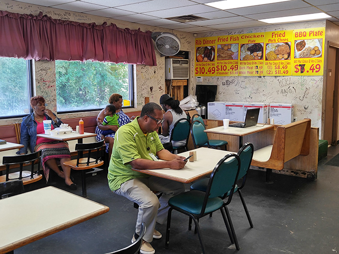 Happy campers in BBQ land! These diners know they've struck culinary gold in this unassuming spot.