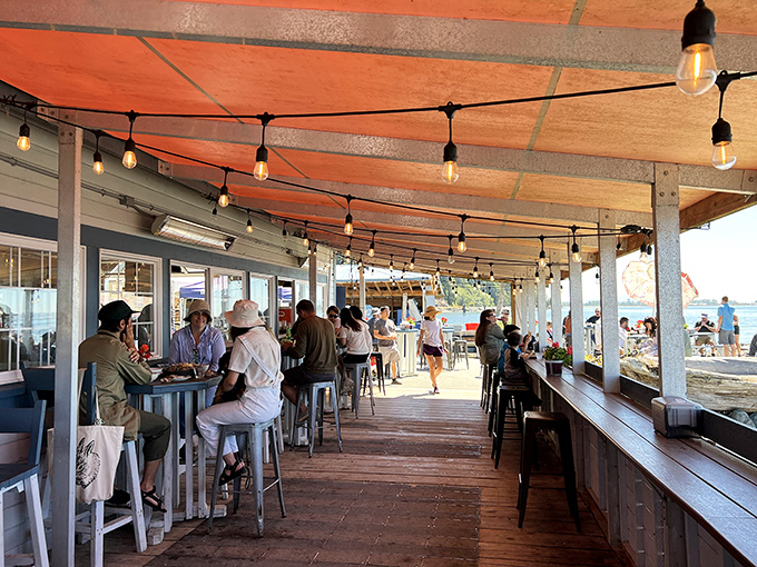 Happy hour, seaside style! Nothing beats good food, good company, and a view that makes you want to write poetry &ndash; or at least a really good Yelp review.